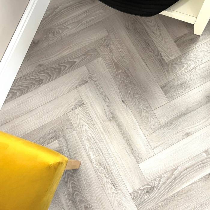 Embrace Herringbone Laminate Flooring Washed Oak 12mm